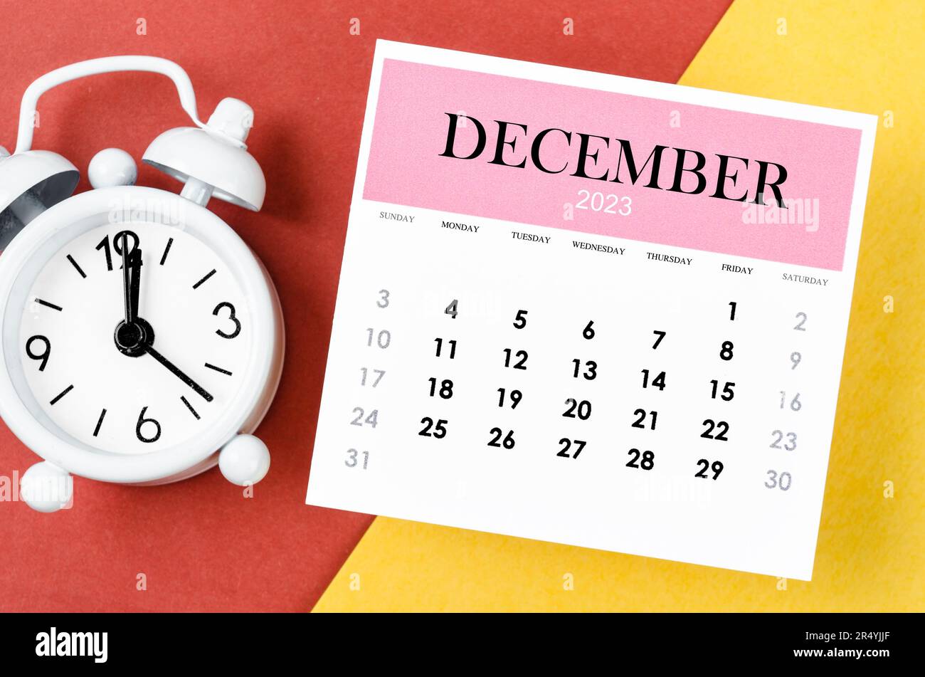 December 2023 Monthly calendar for 2023 year with alarm clock on ...