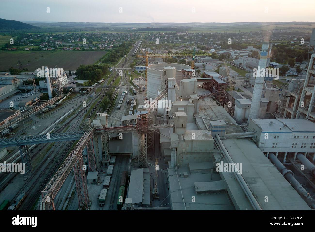 Aerial view of cement factory with high concrete plant structure and ...