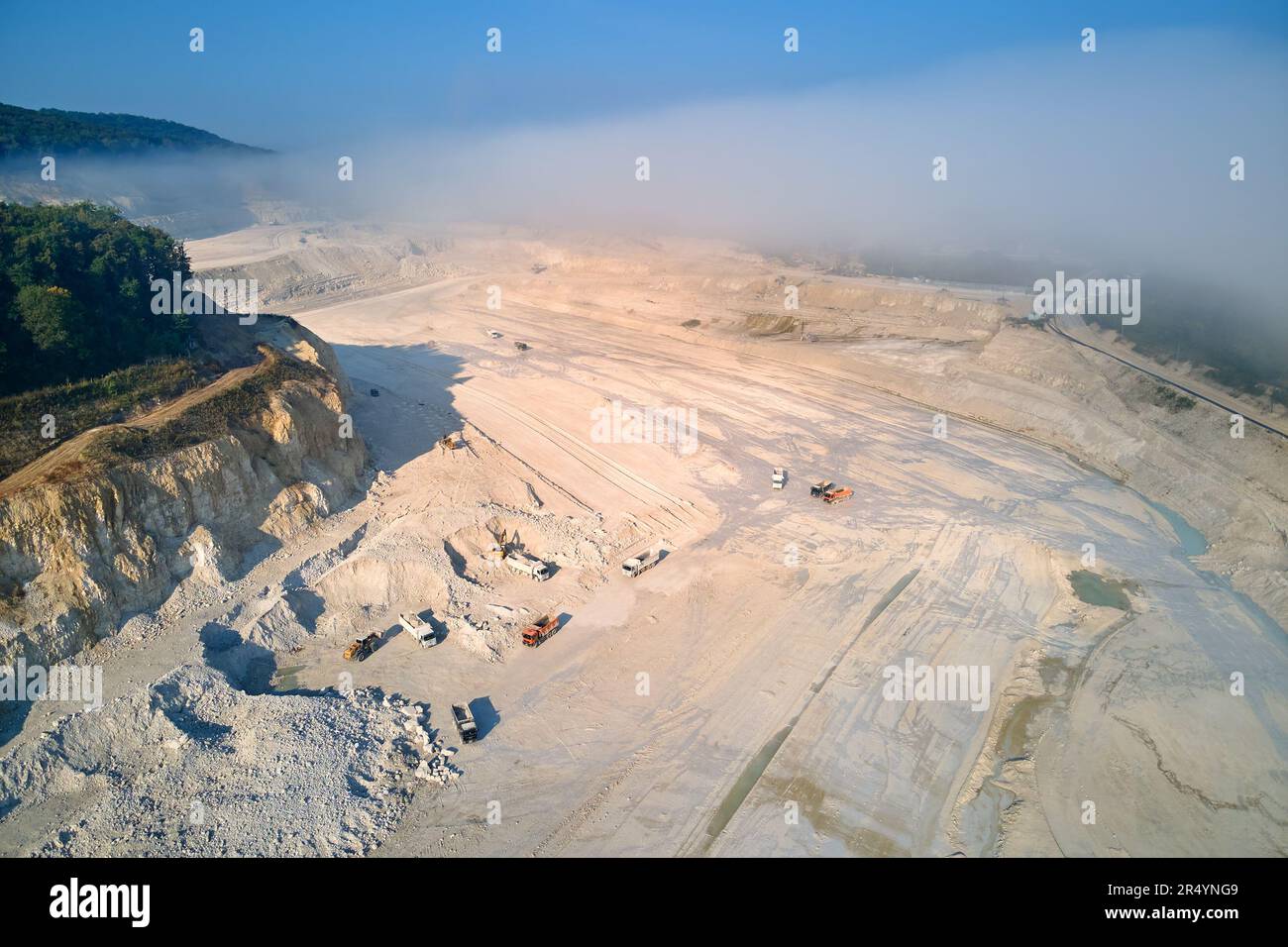 Aerial view of open pit mining of limestone materials for construction ...