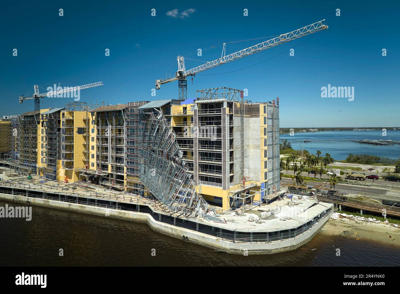 Aerial view of ruined by hurricane Ian construction scaffolding on high ...