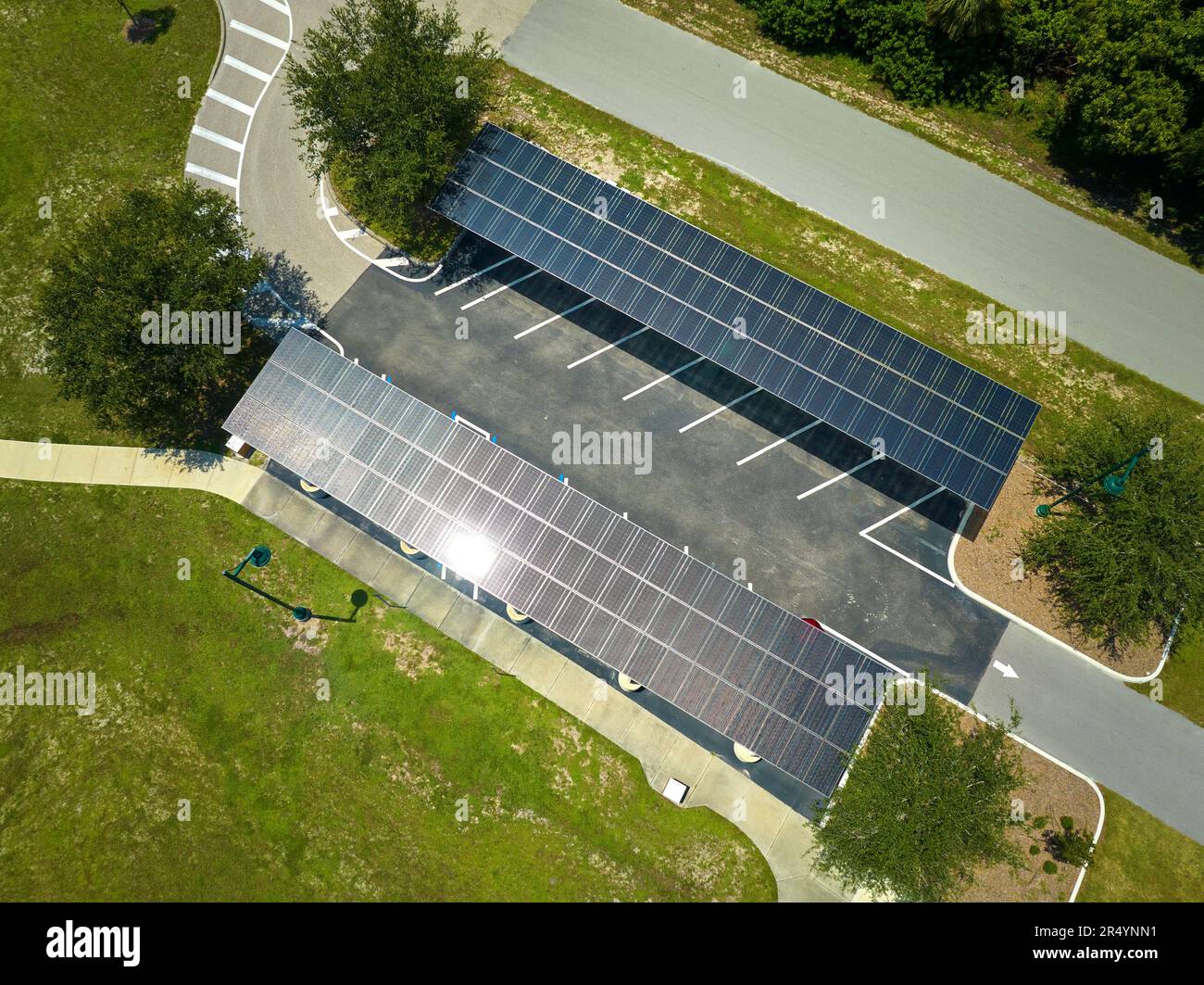 Aerial view of solar panels installed as shade roof over parking lot ...