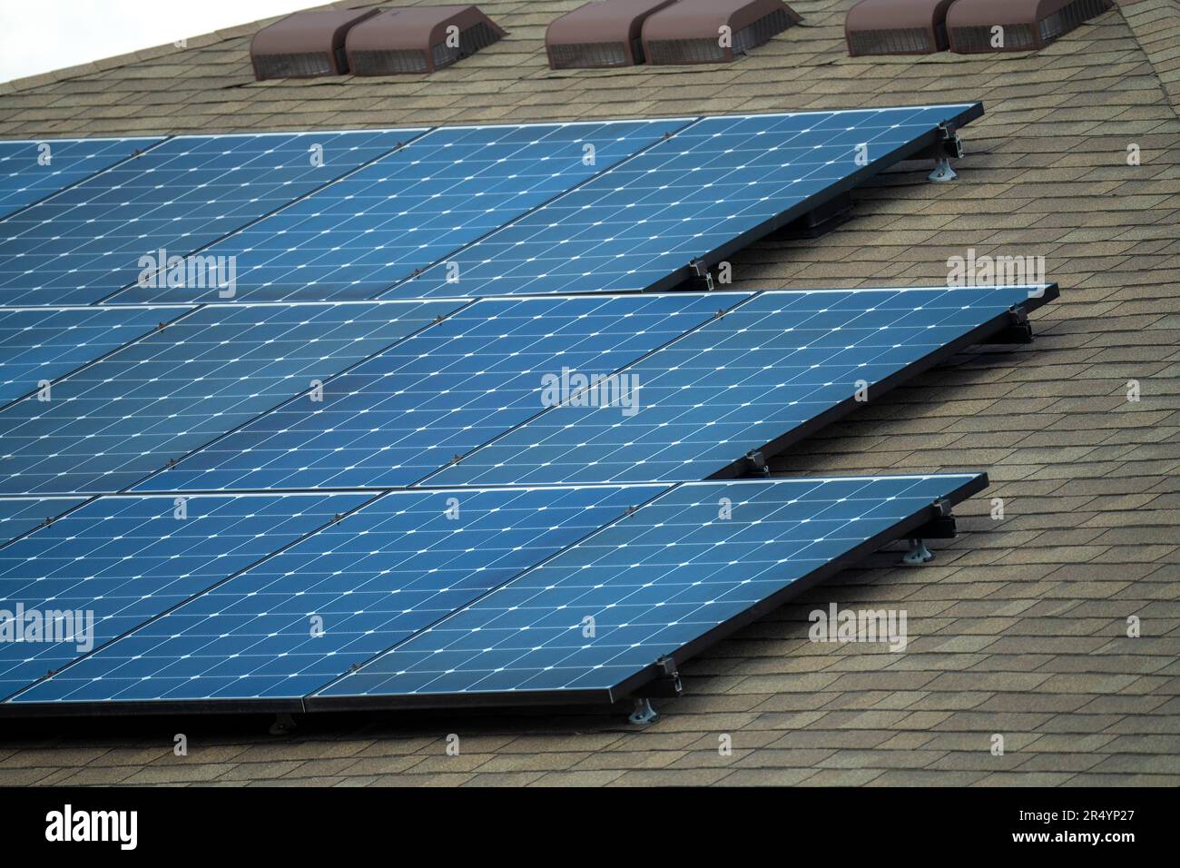 Aerial view of typical american building roof with blue solar ...