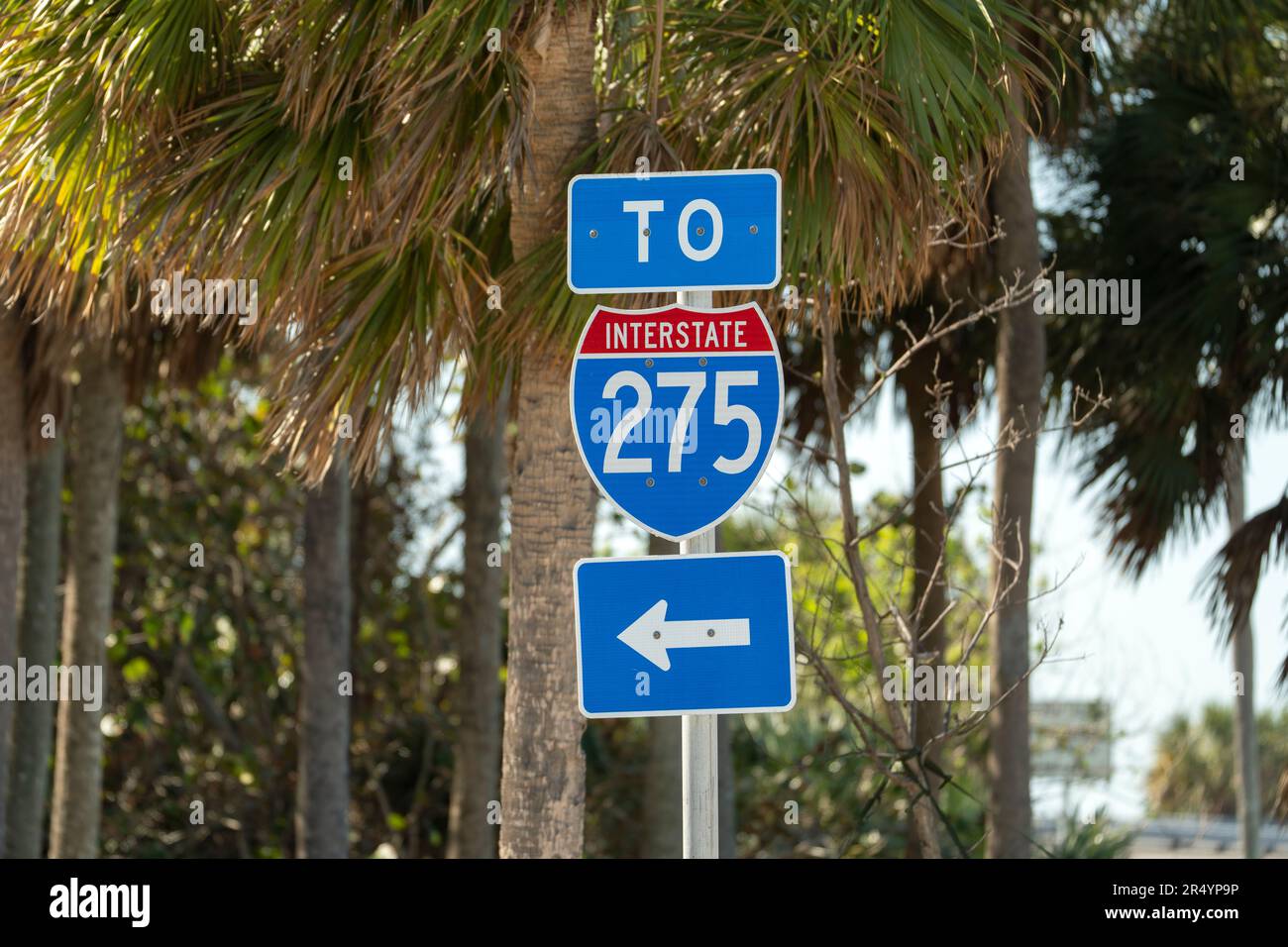 Blue direstional road sign indicating direction to I-275 freeway ...