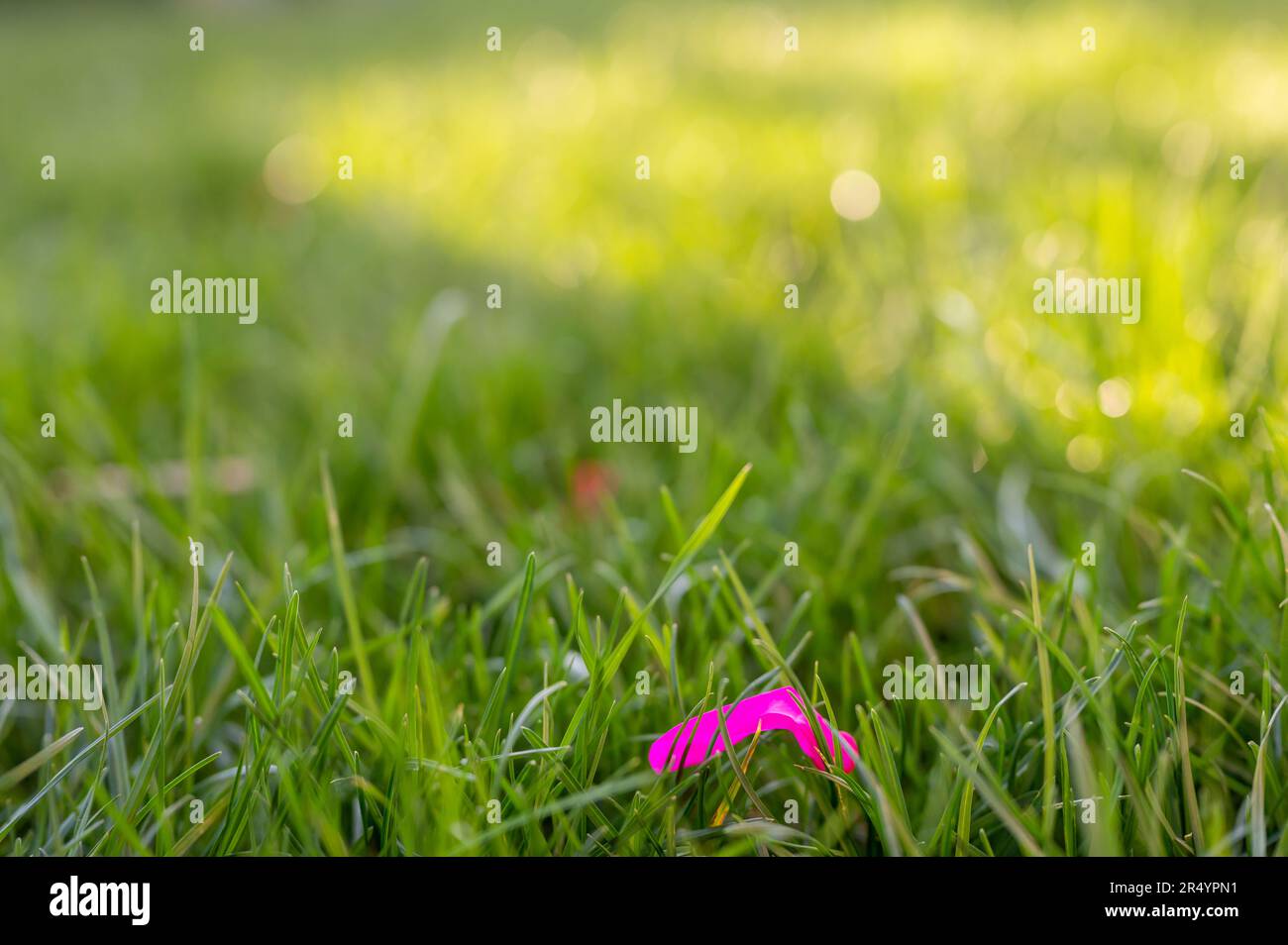 Rubber waste from a used popped water balloon Stock Photo - Alamy