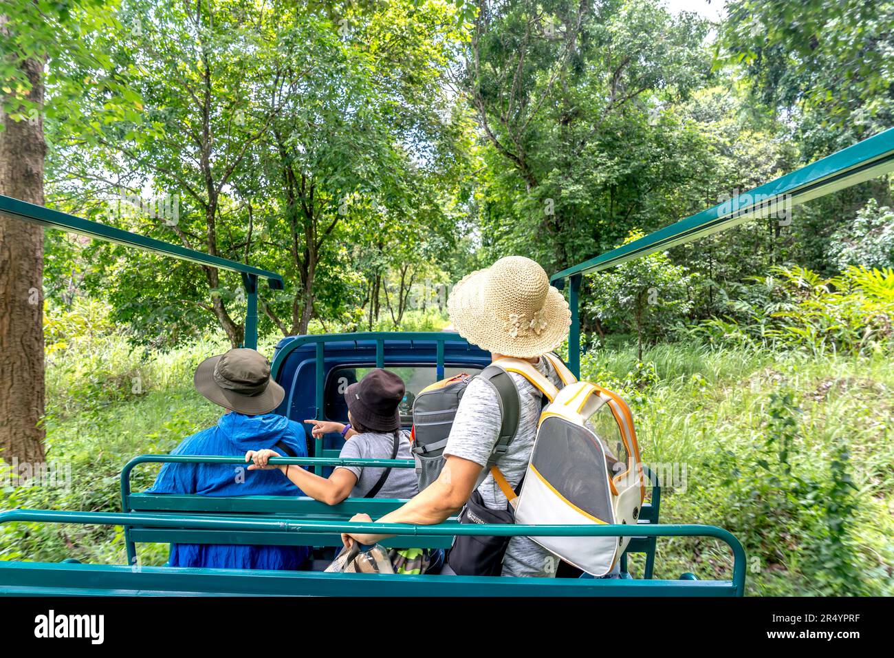 Tourists ride off-road trucks to visit Nam Cat Tien Nature Reserve in ...