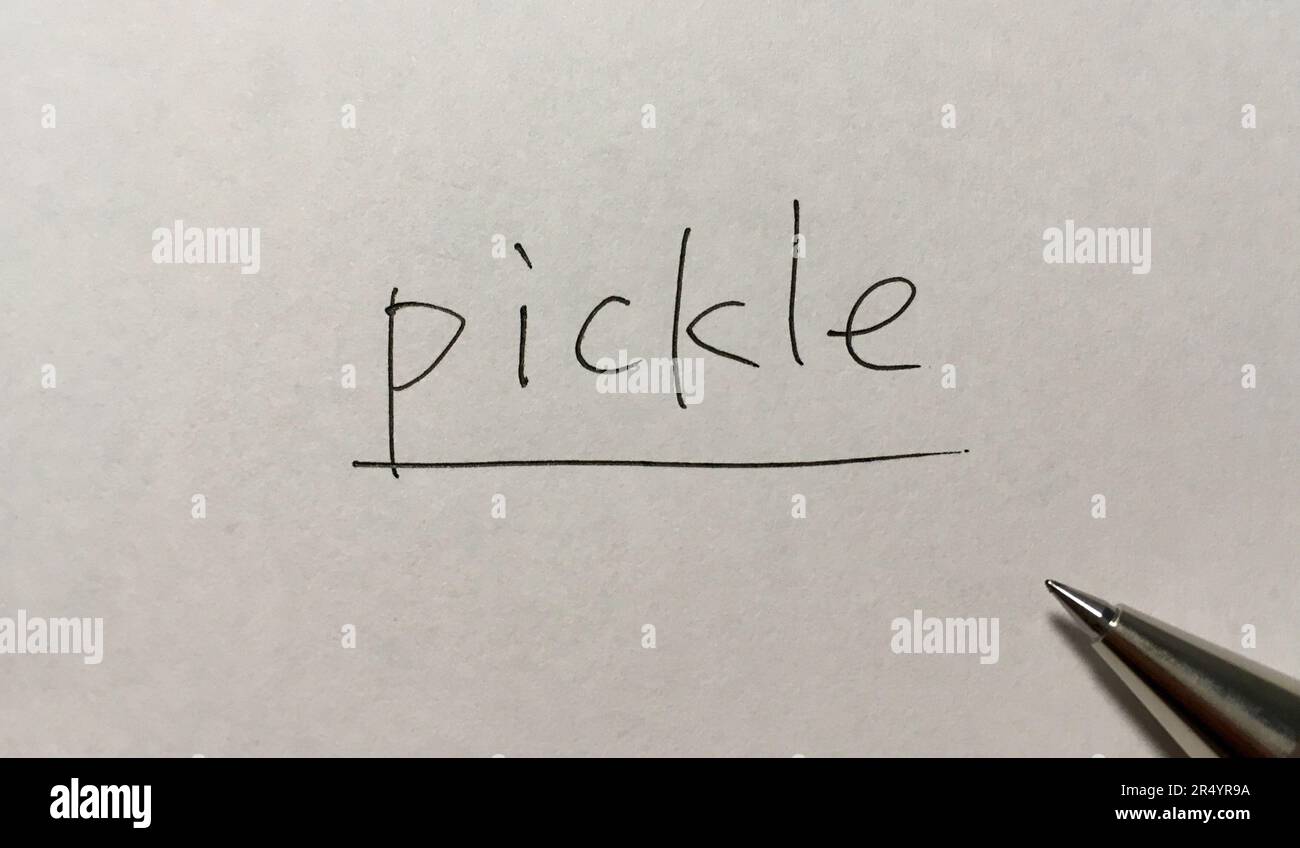 Pickle concept word on paper background Stock Photo - Alamy
