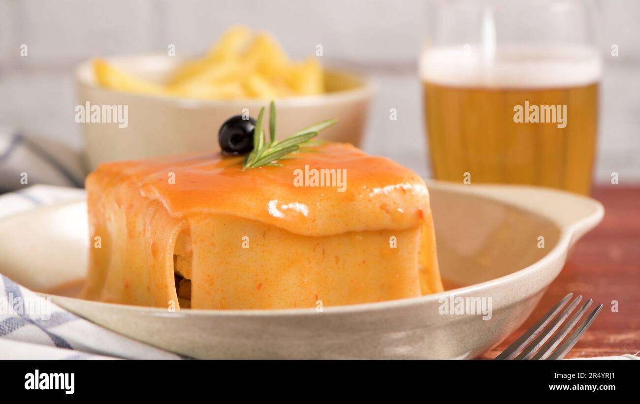 Traditional Portuguese snack food. Francesinha sandwich of bread ...