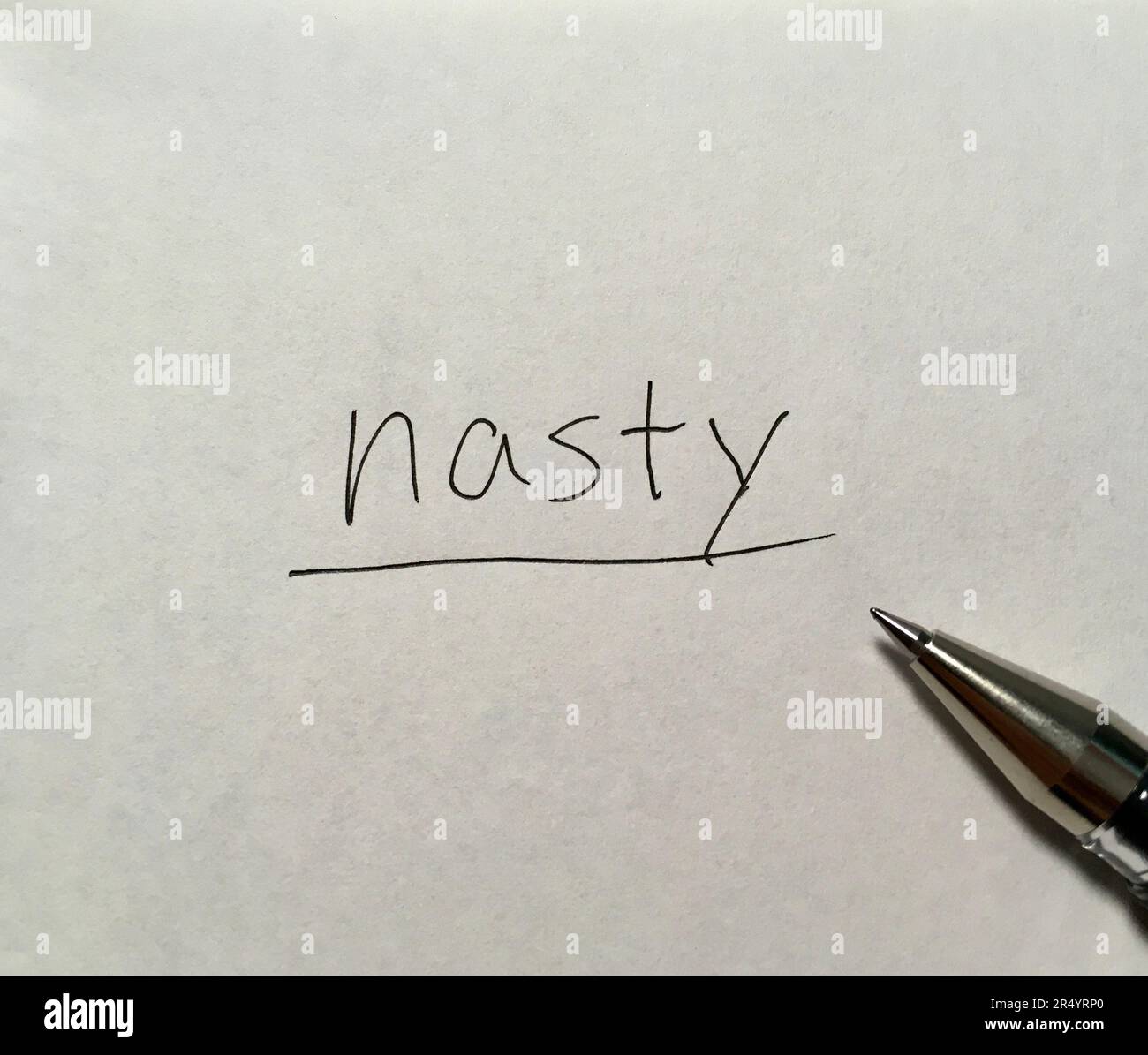 Nasty concept word on paper background Stock Photo - Alamy