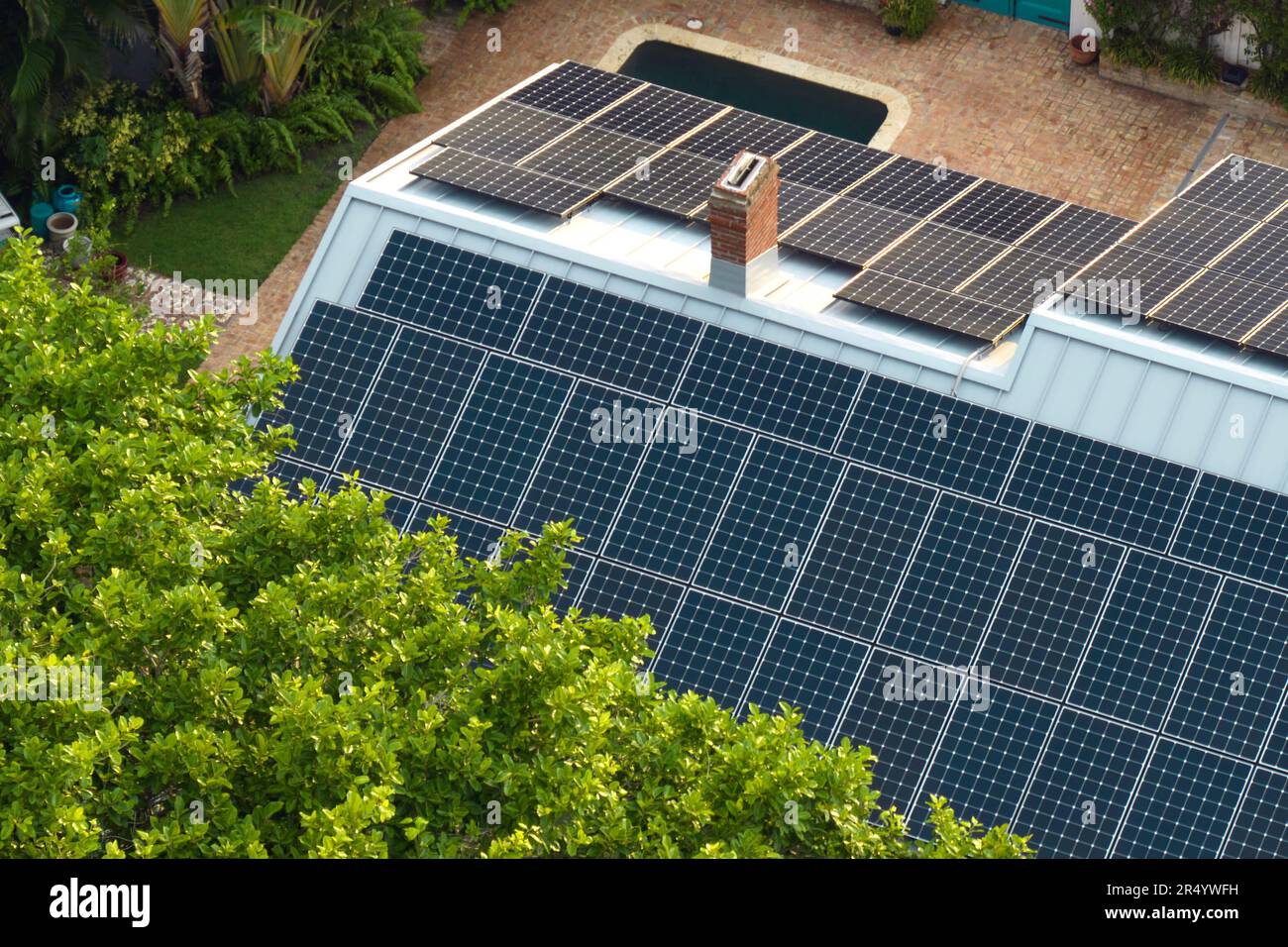 New residential house in USA with roof covered with solar panels for ...
