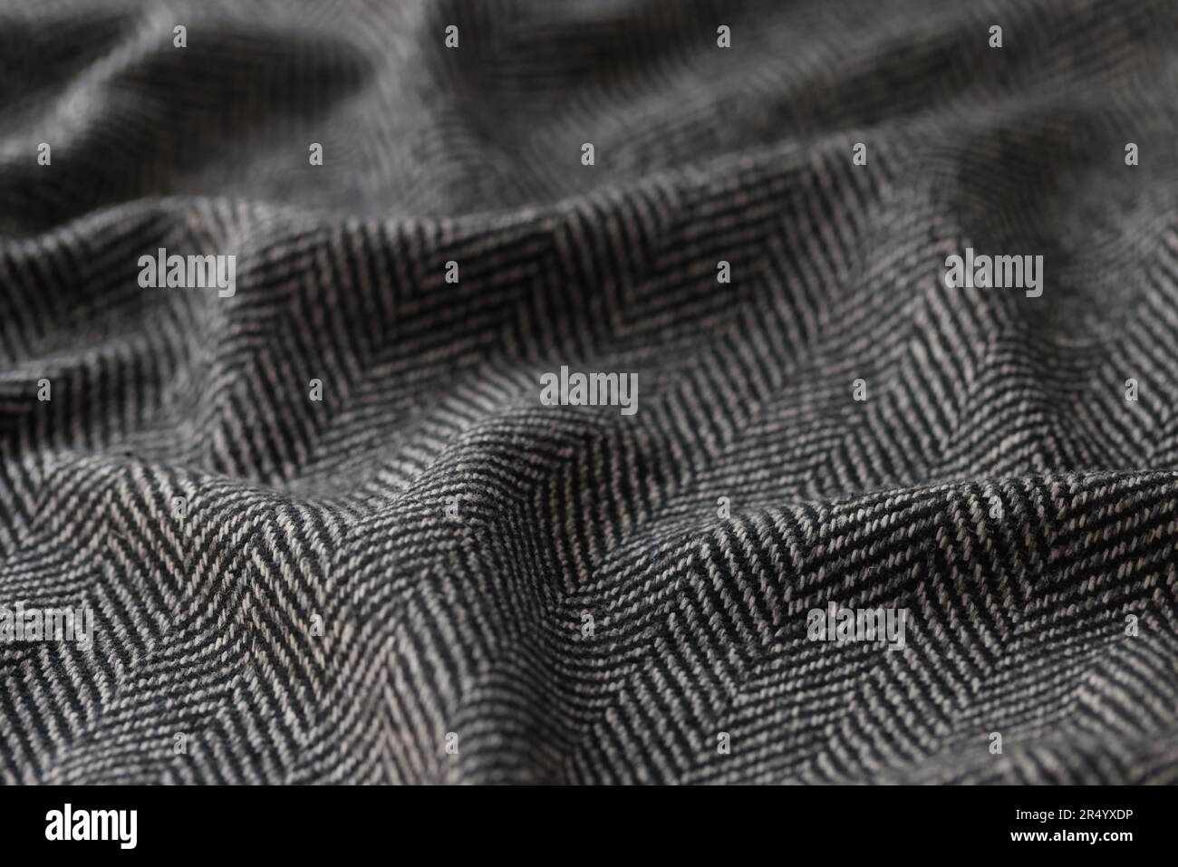 Crumpled black herringbone suit fabric for sale in store Stock Photo ...