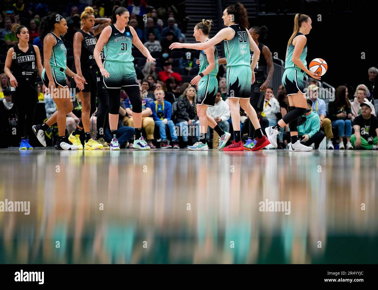 New York Liberty forward Breanna Stewart (30) reaches out to Stefanie ...