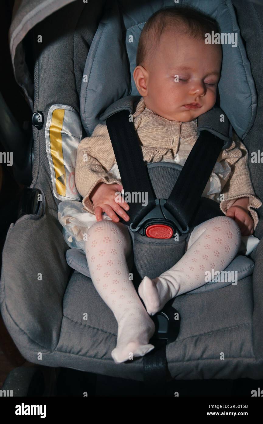 Portrait of newborn baby girl in baby stroller Stock Photo - Alamy