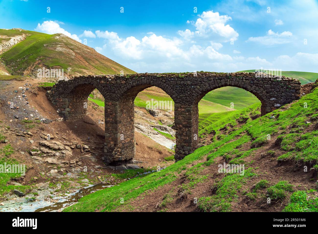 An ancient stone bridge in the suburbs of the city of Gadabay, built by ...