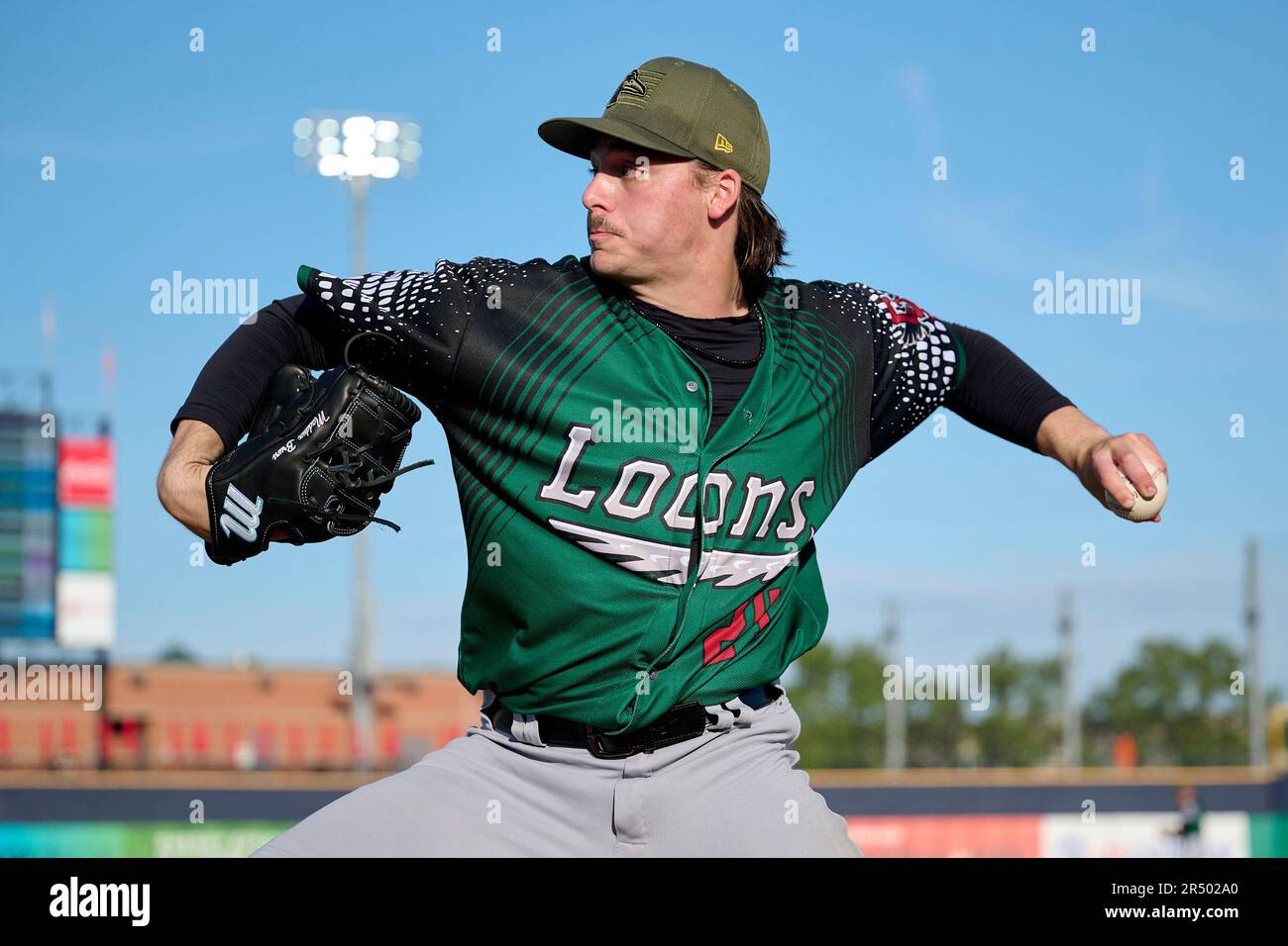 Great Lakes Loons pitcher Maddux Bruns (24) warms up in the bullpen ...
