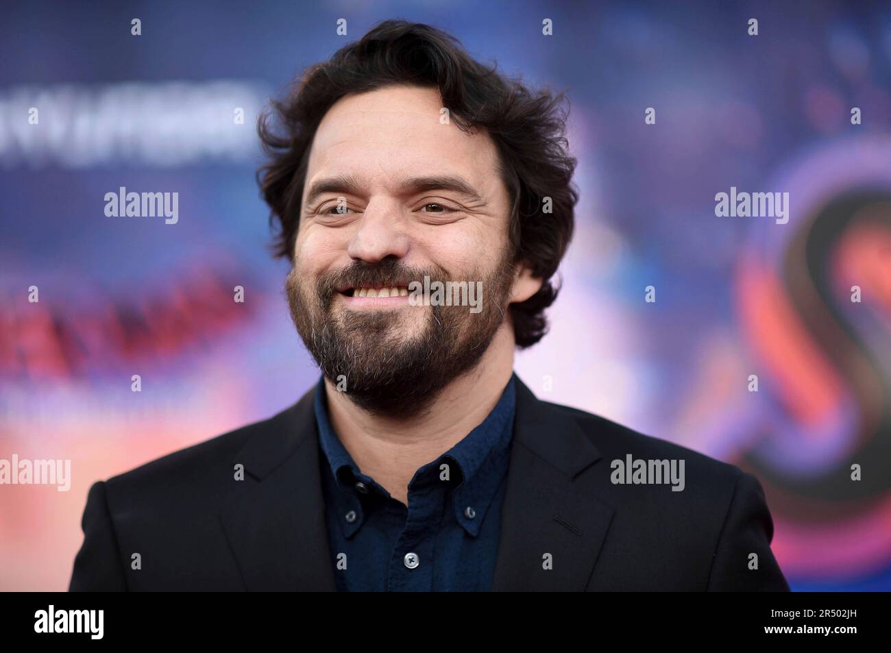 Jake Johnson arrives at the world premiere of "Spider-Man: Across The ...