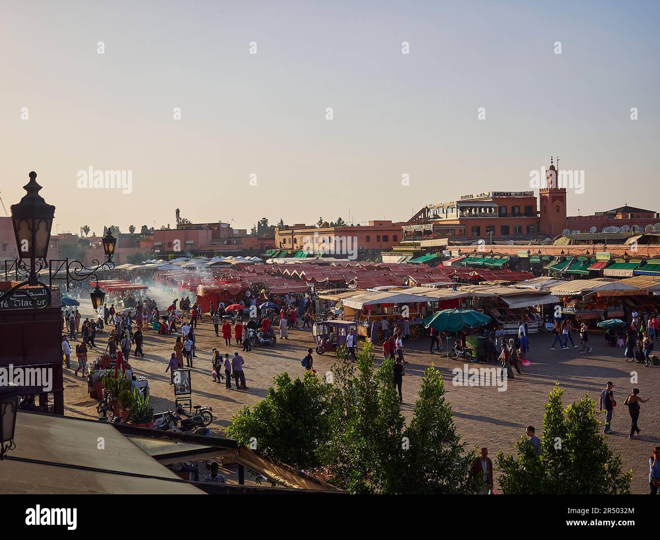 Panoramic view of Jemaa el Fnaa suq square and market at the medina of ...