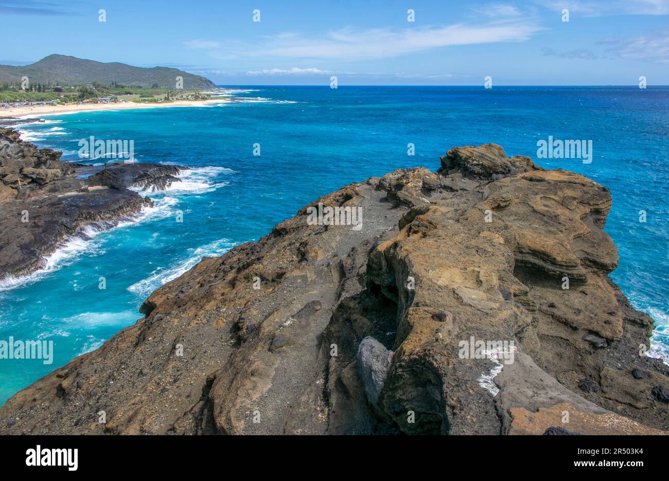 Rocky ledge into stunning blue ocean. Perfect for your imaginative ...