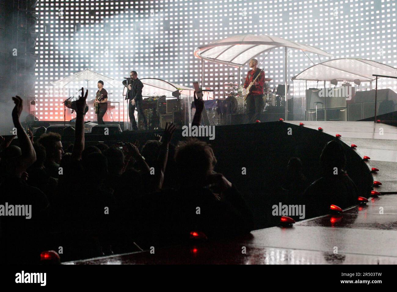 U2 play to a crowd of 70,000 at Telstra Stadium on their Vertigo tour ...