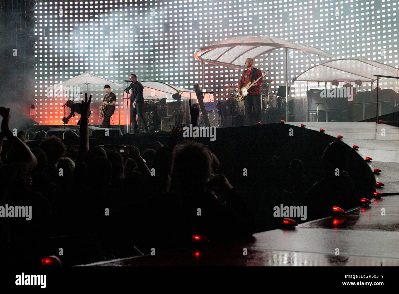 U2 play to a crowd of 70,000 at Telstra Stadium on their Vertigo tour ...