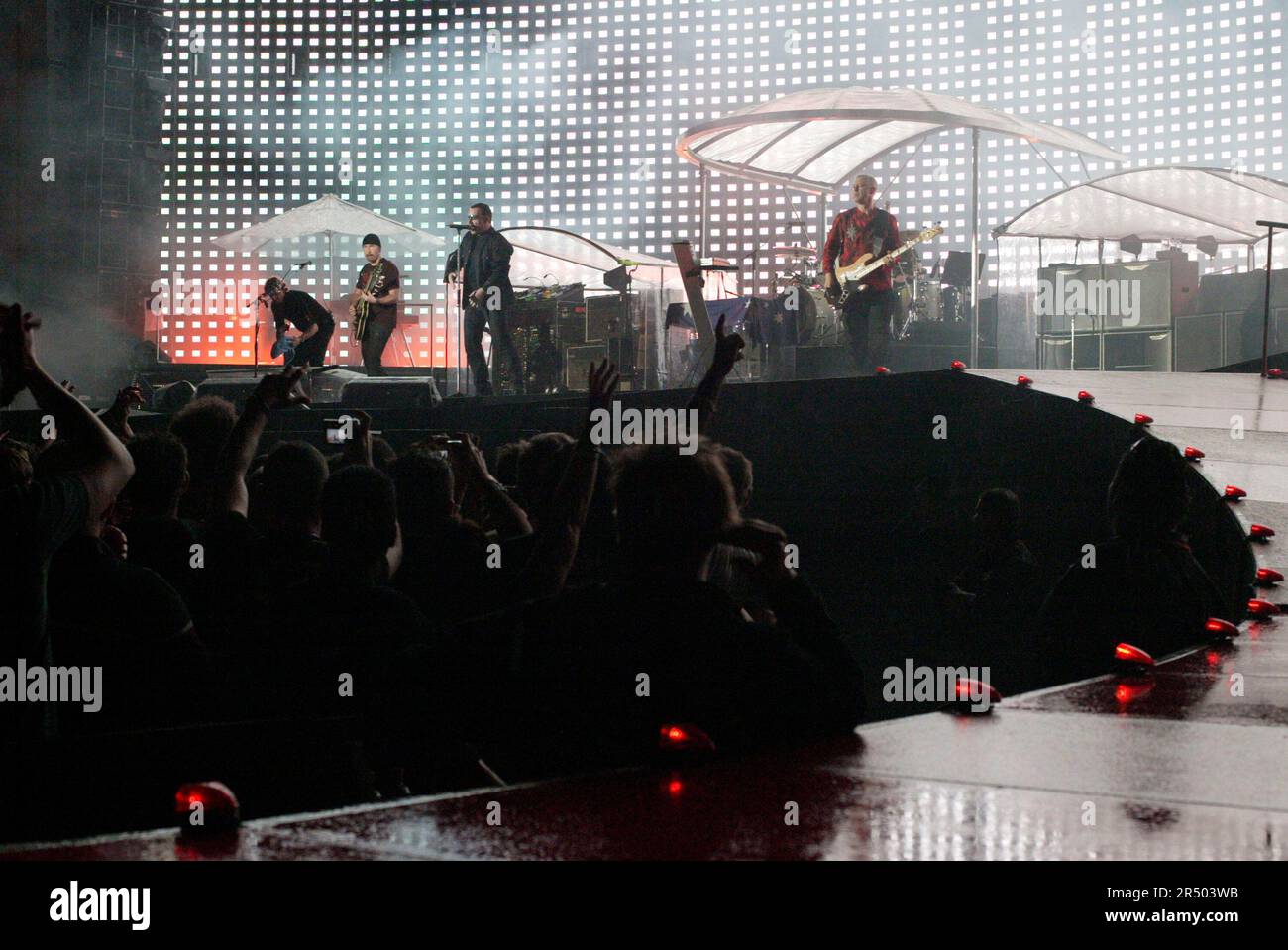 U2 play to a crowd of 70,000 at Telstra Stadium on their Vertigo tour ...