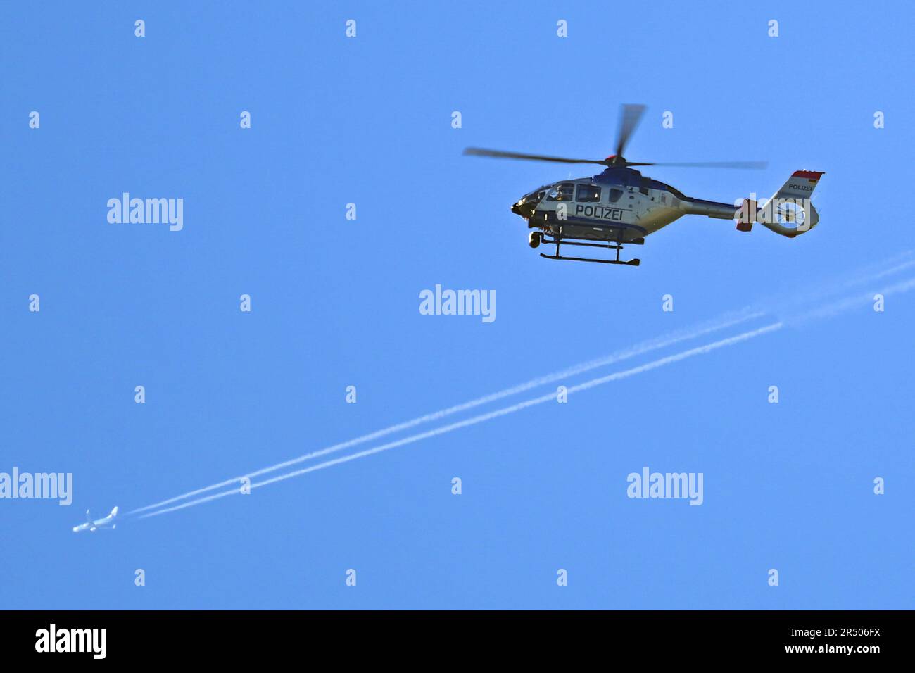 Dresden, Germany. 31st May, 2023. A police helicopter flies over the ...