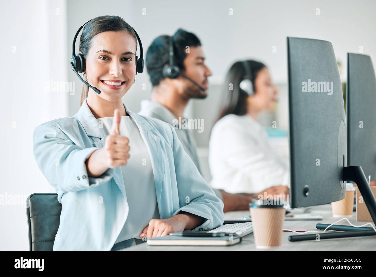 Young woman, thumbs up and call center portrait with smile for ...
