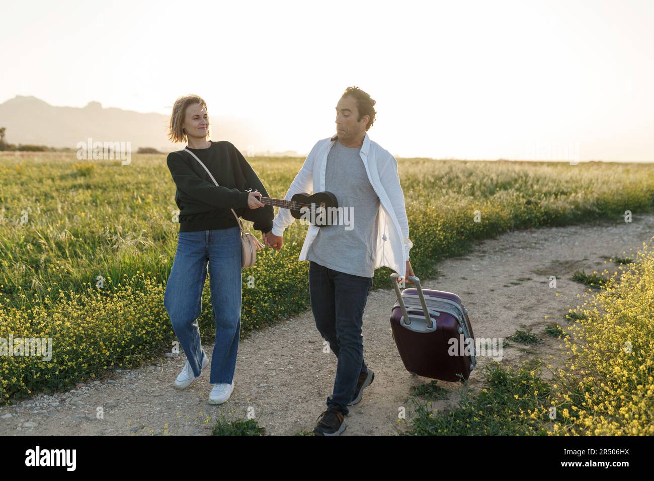 Inspired young loving couple is looking at living plan in future. They ...