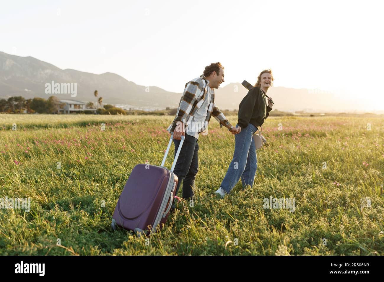 Inspired young loving couple is looking at living plan in future. They ...