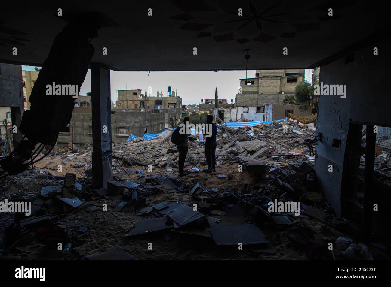 Palestine. 30th May, 2023. Palestinian children stand amid the rubble ...