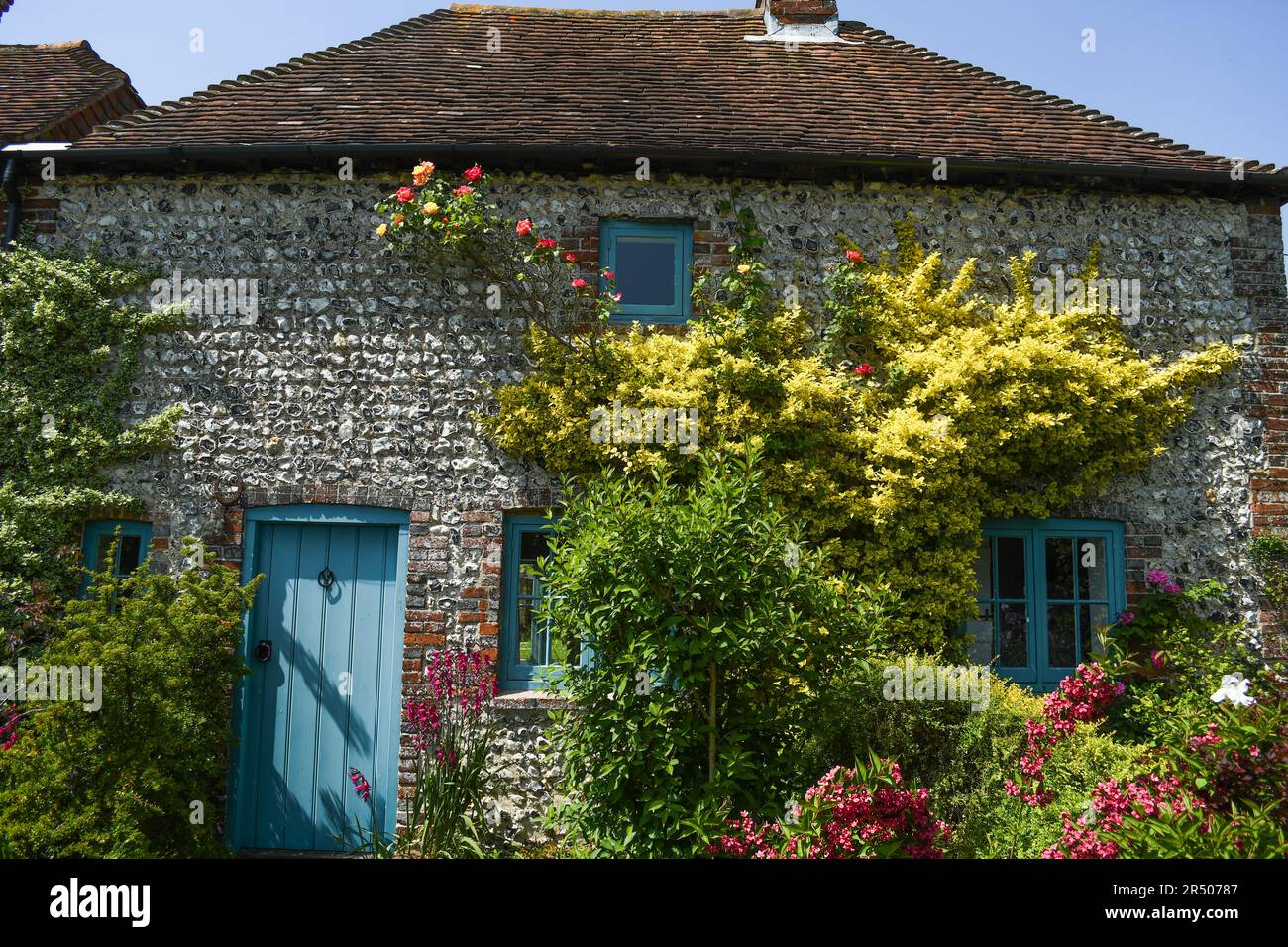East Dean cottage and garden Stock Photo - Alamy