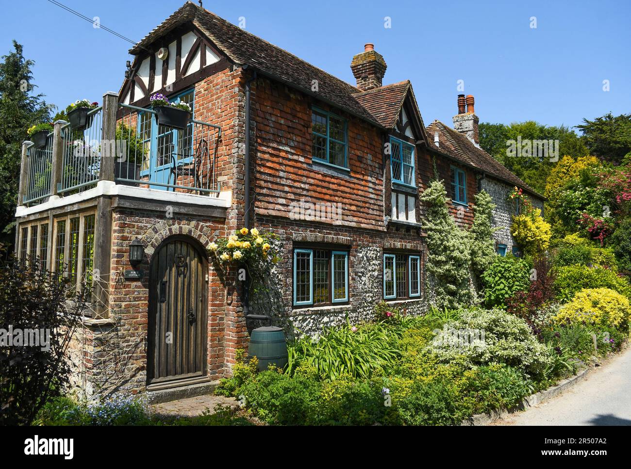 East Dean cottage and garden Stock Photo - Alamy