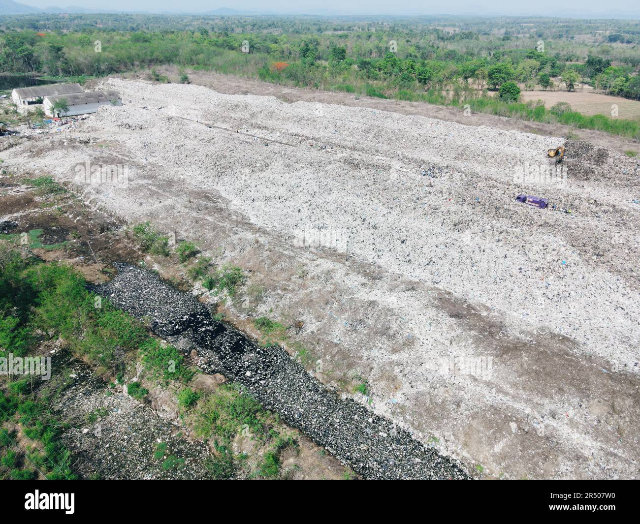 Aerial view landfill garbage waste huge dump environmental pollution ...