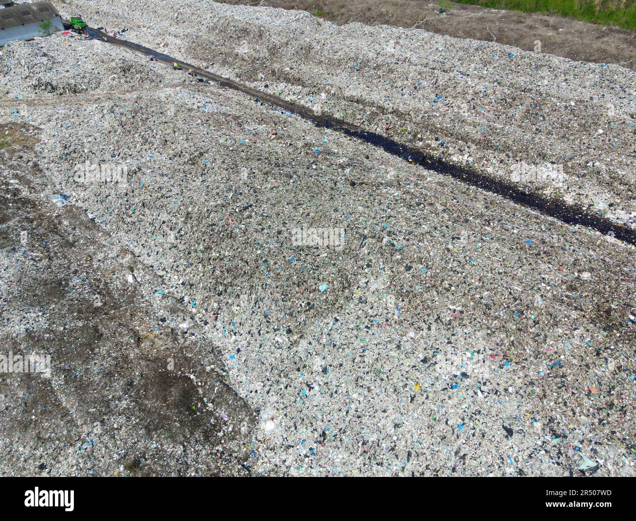 Aerial view landfill garbage waste huge dump environmental pollution ...