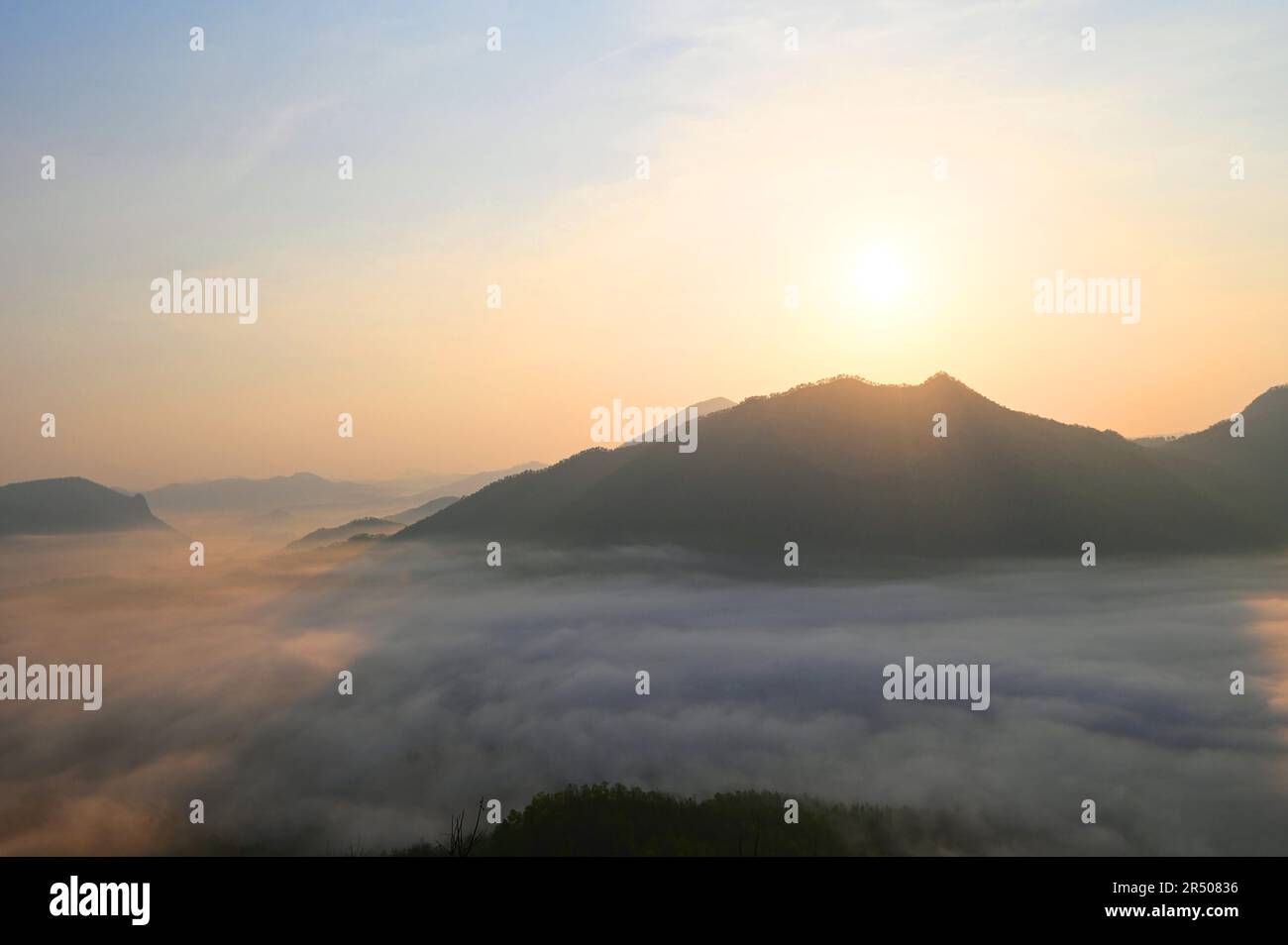 sunrise mist cover mountain background winter foggy view at beautiful ...
