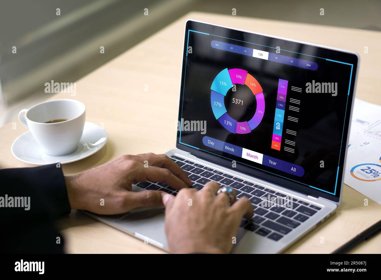 Analyst working with business analytics and data management system on ...