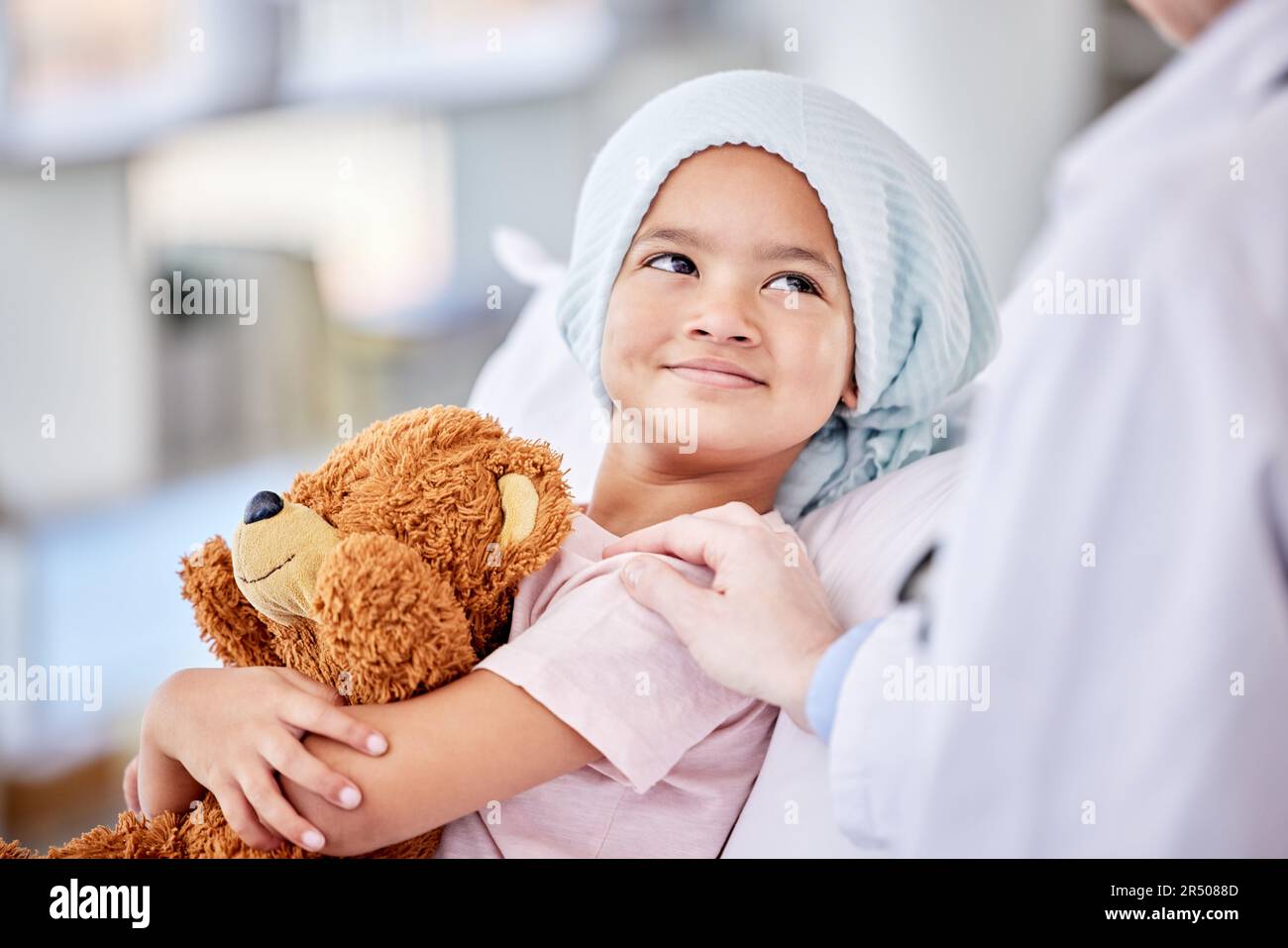 Cancer patient, child and doctor with support, healthcare service and ...