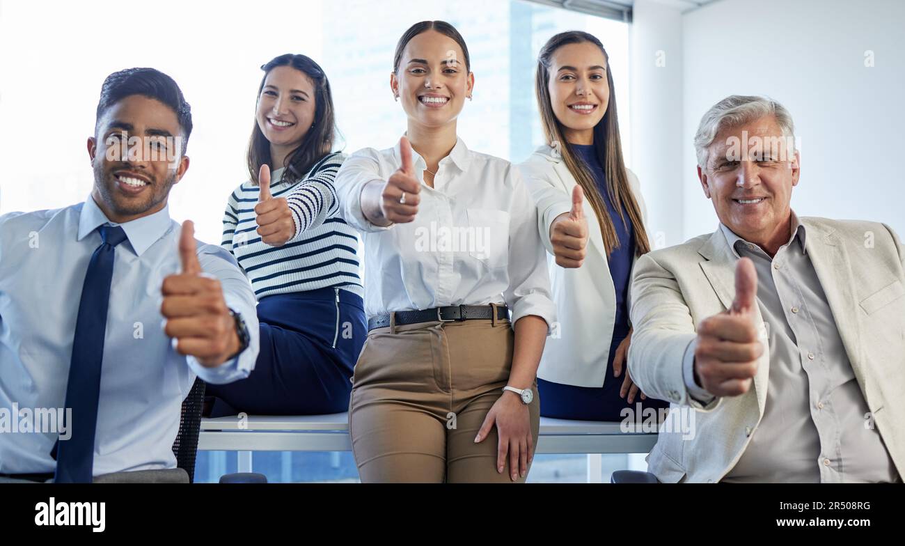 Business people, teamwork and thumbs up in office portrait for ...