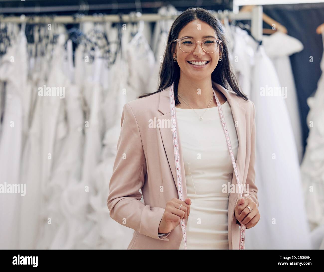 Happy, portrait of woman seamstress working and in a bridal boutique ...