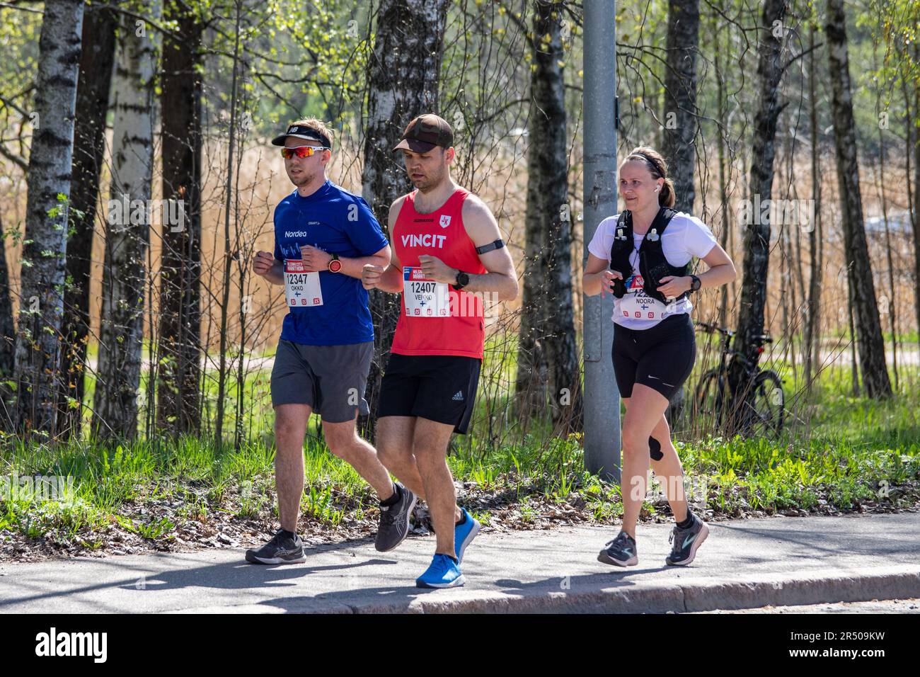 Helsinki City Marathon participants running at Ramsaynranta in ...