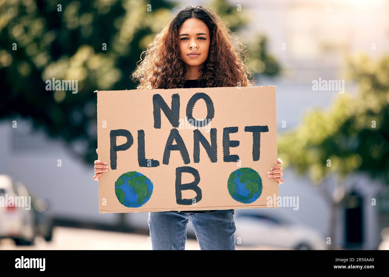 Woman, poster and portrait in street for planet, climate change and ...