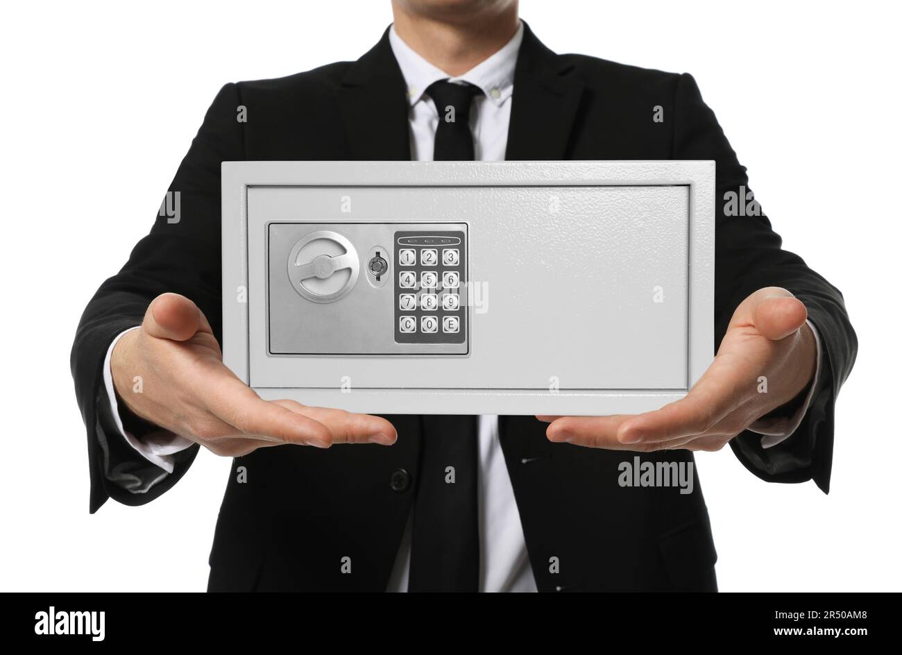 Financial security, keeping money. Businessman holding steel safe on ...