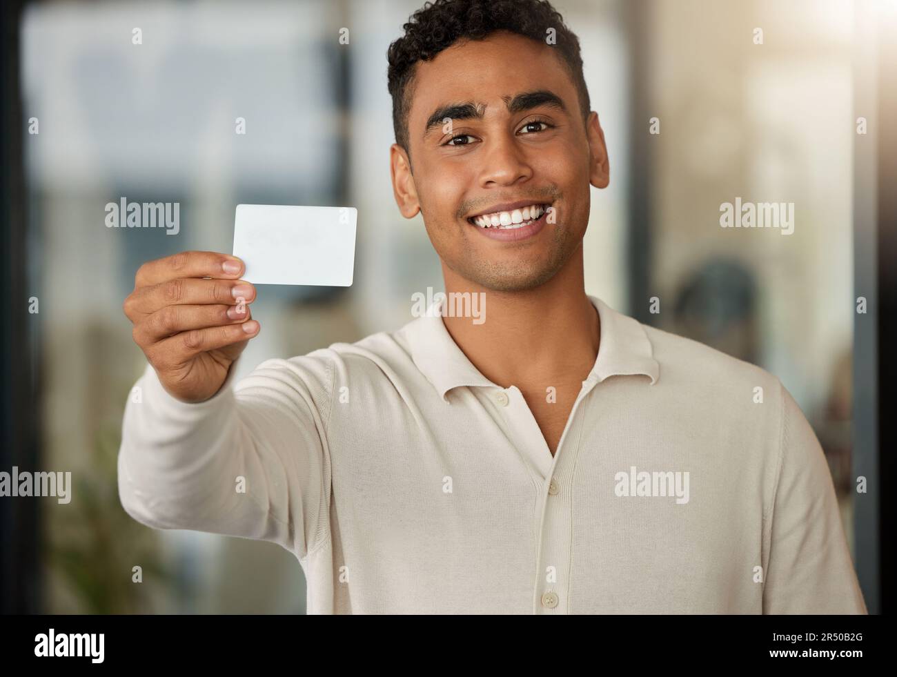 Portrait of happy man showing business card, networking and branding ...