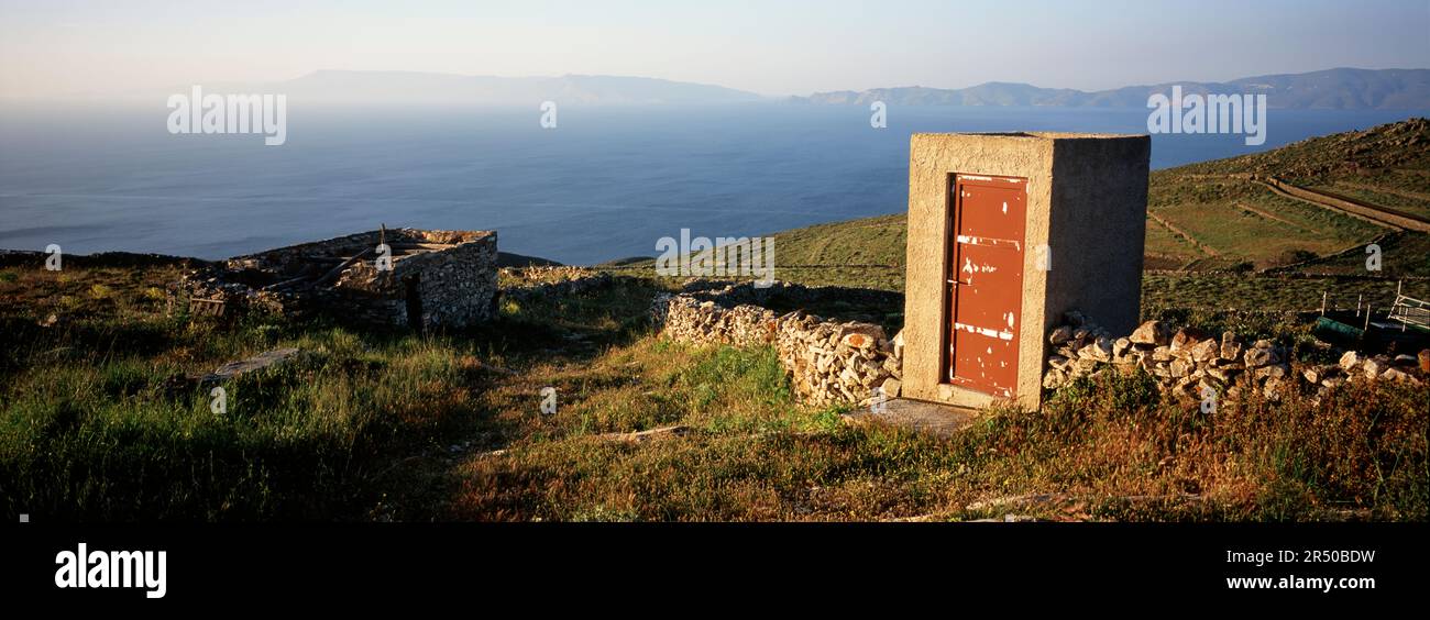 Concrete shed on the hillside outside Kini on the Greek island of Syros ...