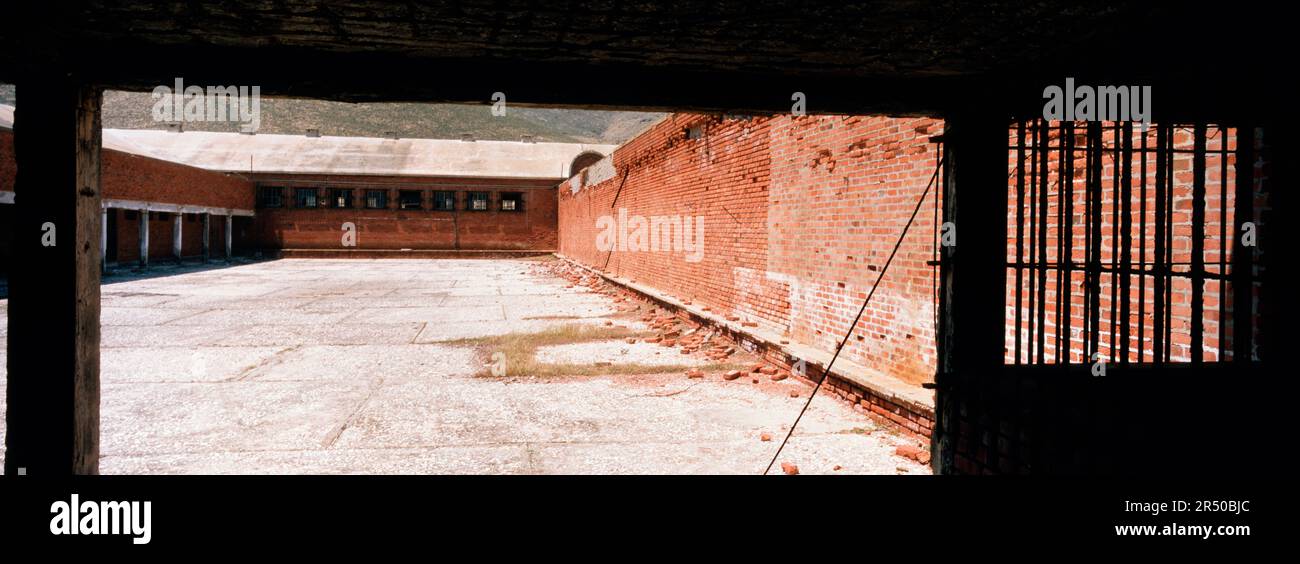 Courtyard or exercise yard in Gyaros prison. The prison was used until ...