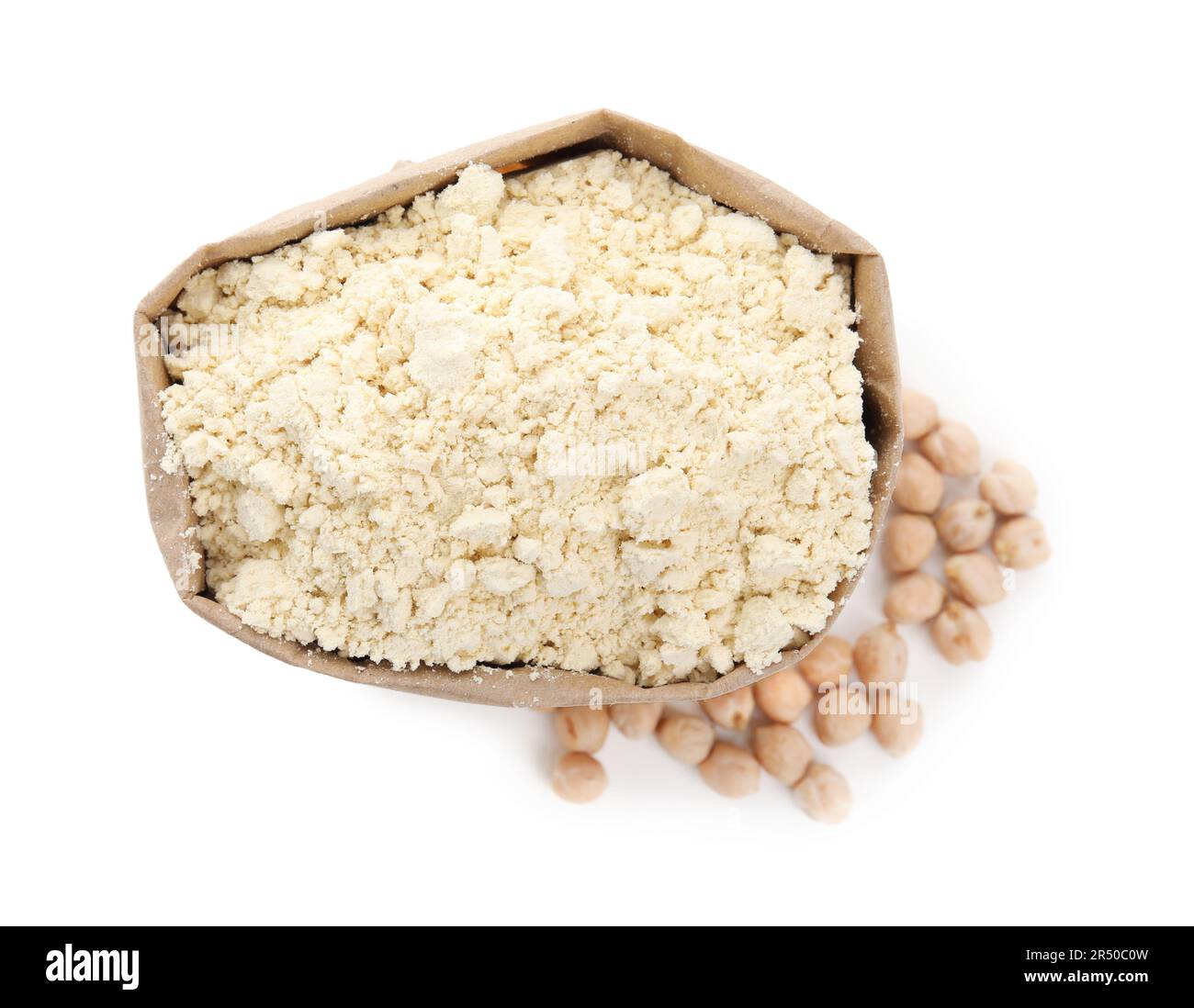 Chickpea flour in paper bag and seeds isolated on white, top view Stock ...