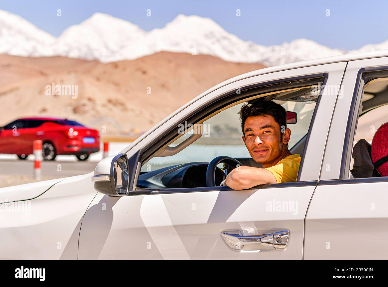 Urumqi. 14th Apr, 2023. Alimjan Dawut poses for a photo in his sixth ...