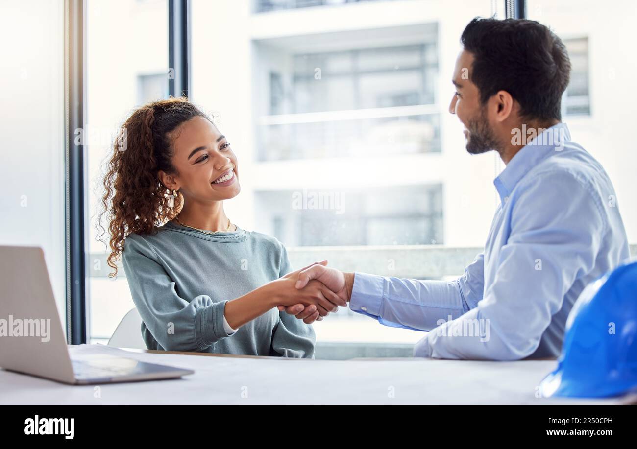 Handshake, construction worker and woman or partner for business ...