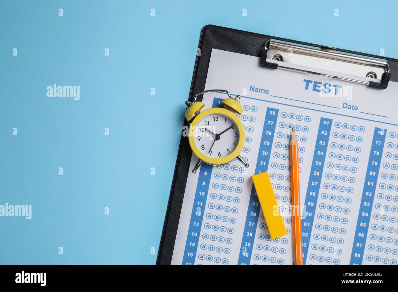 Student passing exam. Clipboard with answer sheet, pencil and alarm ...