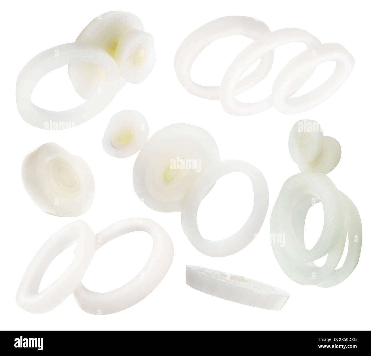 Fresh raw onion rings falling on white background Stock Photo - Alamy