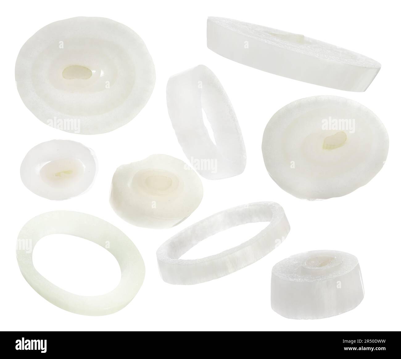 Fresh raw onion rings falling on white background Stock Photo - Alamy